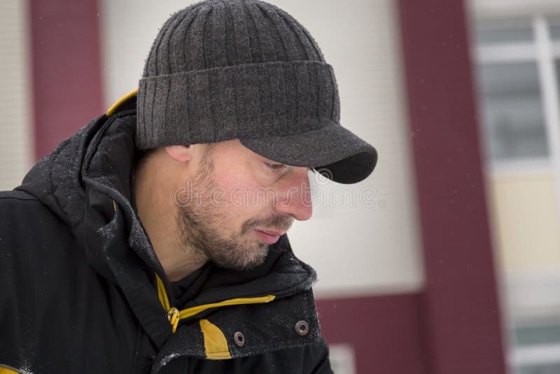 Portrait of a Worker in a Black Cap Stock Photo - Image of chilling ...