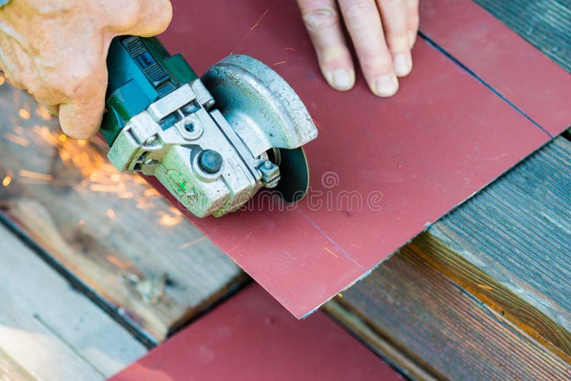 Close-up of Worker Cutting Metal with Angle Grinder Stock Image - Image ...