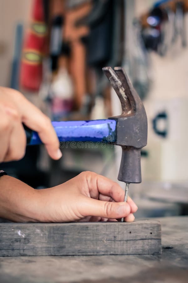Close Up Worker Hammering Nail into Wood, Vintage Style Stock Image ... Close Up Worker Hammering Nail into Wood, Vintage Style Stock Image ...