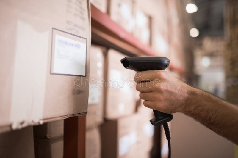 Close Up of Worker Holding Scanner in Warehouse Stock Image - Image of ...