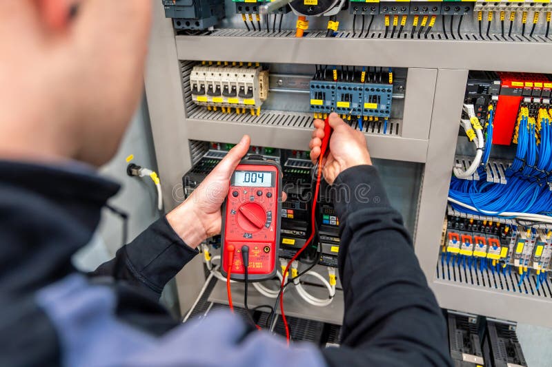 Close-up of a Worker Repairing an Electrical System Panel Stock Photo ...