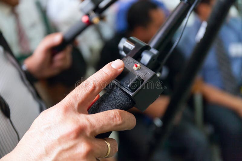 Close-up of Working Camera of Man Hand, Operator at Work. in the Hall ...