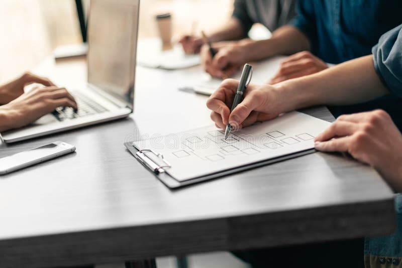 Close Up. Working Group Works with Marketing Schedules Stock Photo ...