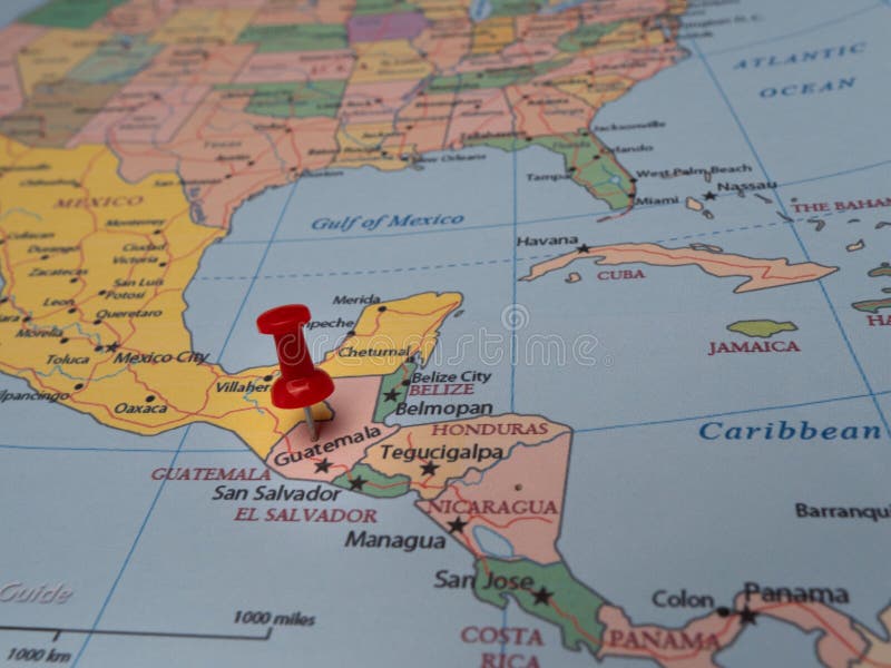 Close-up of a World Map with a Pin Pointing To the Location of ...