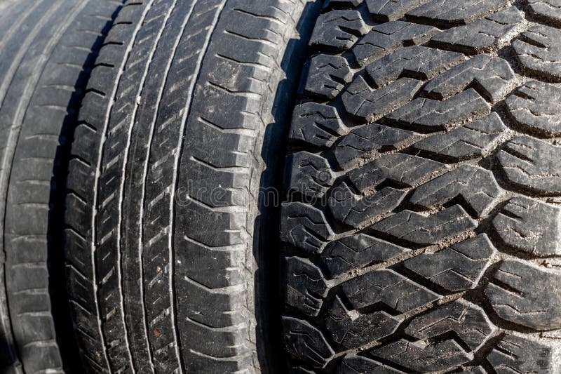 Close-up of Worn and New Tire Treads Showcasing Different Patterns ...