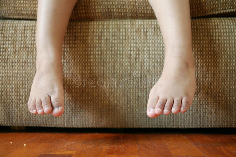 Close Up of 5 Years Old Child Dry Feet Sitting on Sofa Stock Image ...