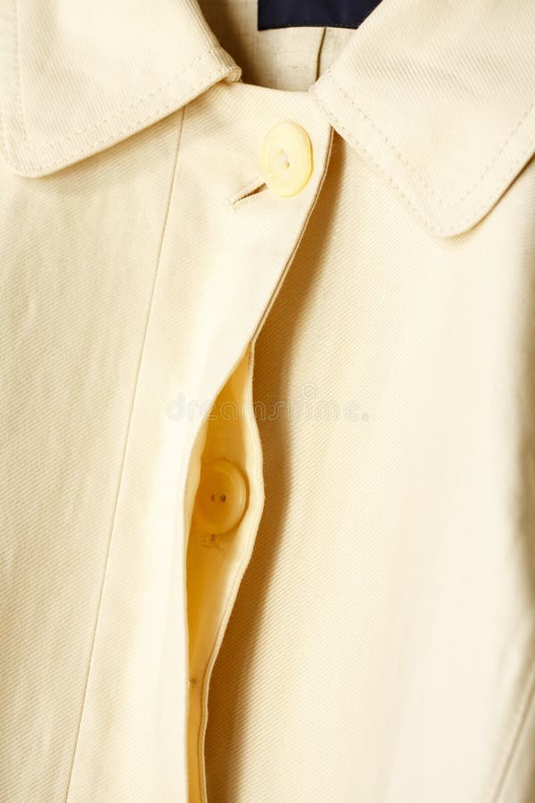 Close-up of a Yellow or Beige Trench Coat of the Fly Front Stock Photo ...