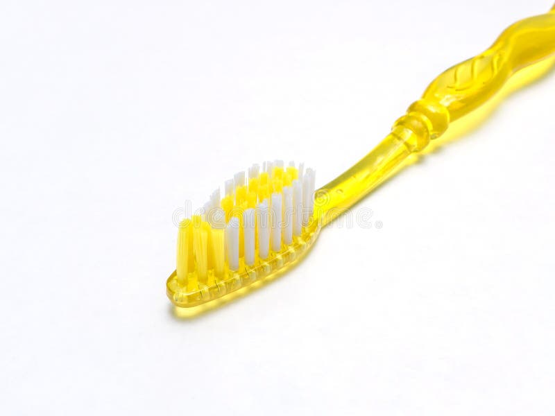 Close up yellow toothbrush stock image. Image of toiletries - 46635165