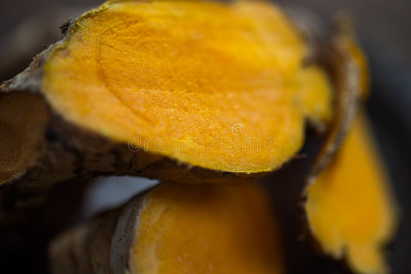 Close Up Yellow Turmeric on Wood Table Stock Photo - Image of aroma ...