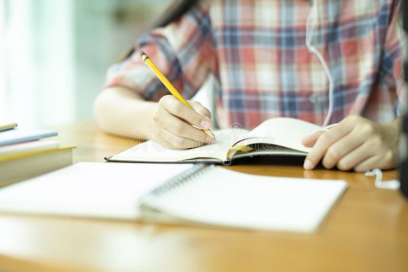 Close Up Young Asian Woman Study in Front of the Noetbook at Office ...