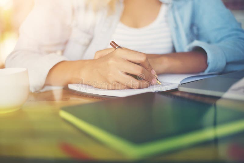 Close-up of Young Beautiful Woman Hands Writing and Work with L Stock ...