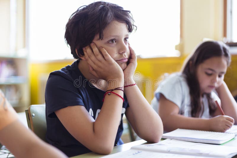 Close Up of Young Caucasian Boy Interested in Learning in Class Stock ...