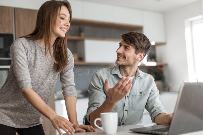 Close Up. Young Couple Looking at Laptop Screen Stock Image - Image of ...
