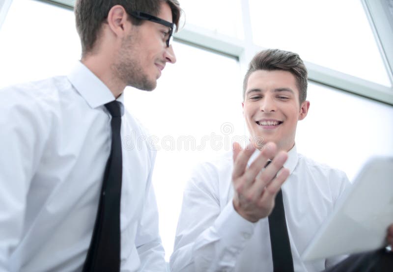 Close Up.young Employees Discussing New Ideas Stock Image - Image of ...