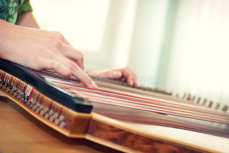Close Up of Young Girl S Hand Playing on Zither Stock Photo - Image of ...
