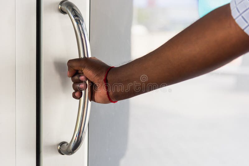 Person Pulling Door Open