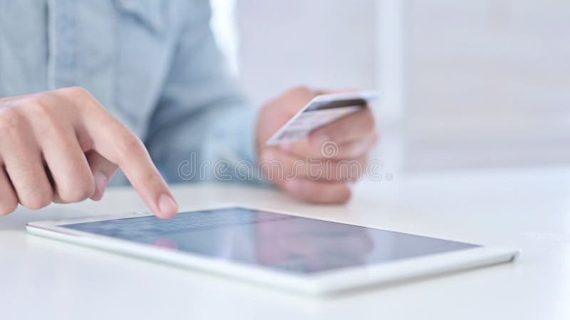 Close Up of Young Hands Using Credit Card on Tablet Stock Image - Image ...