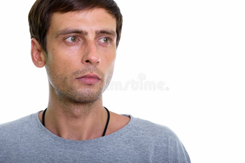 Close Up of Young Handsome Man Thinking while Looking at Distanc Stock ...