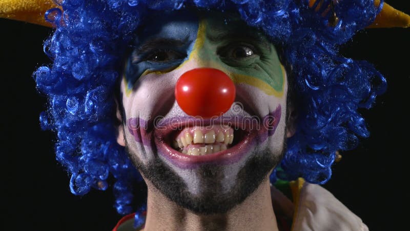 Close-up of Young Hilarious Clown Making Funny Faces Stock Footage ...