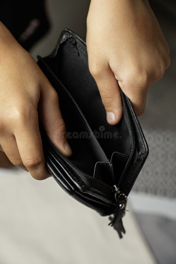 Close Up of Young Kid Holding Opened Empty Black Leather Wallet Stock ...