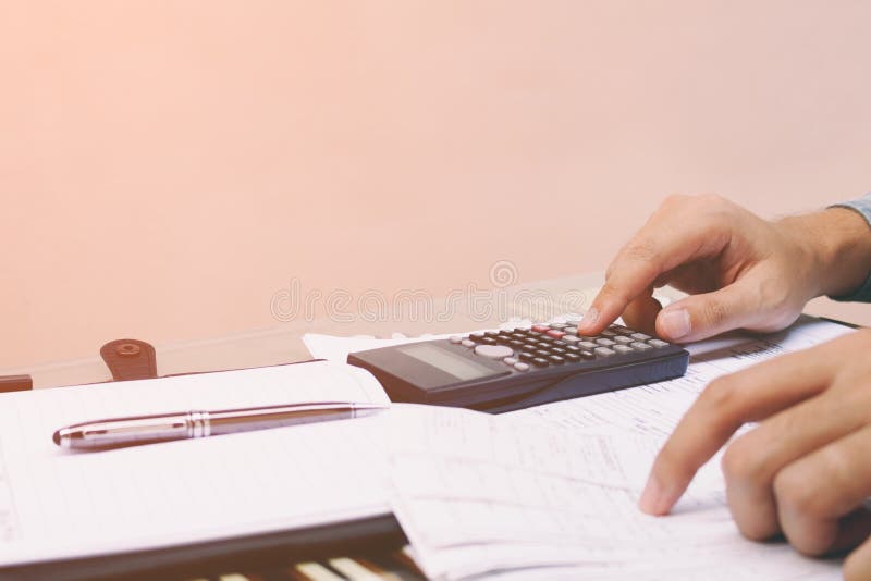 Close Up Young Man with Calculator Counting at Home with Copy Space ...