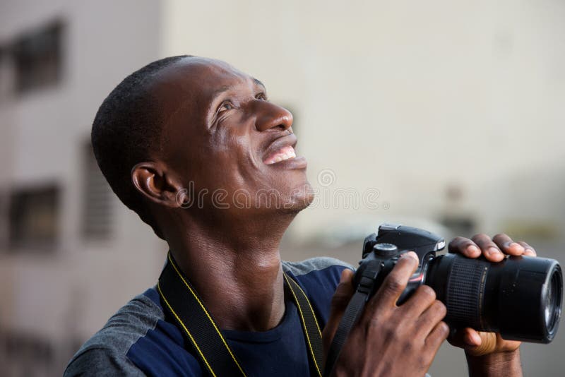 Close Up of Young Man with Camera, Smiling Stock Photo - Image of shot ...
