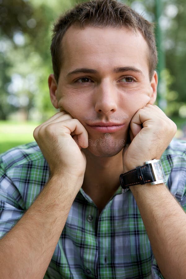 Close-up of Young Man Contemplating Stock Image - Image of away, hand ...