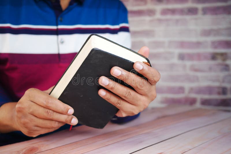 Close Up of Young Man Hand Reading a Book Stock Photo - Image of hand ...