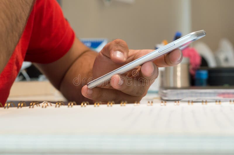 Close Up of Young Man Hand Using Mobile Smart Phone in the Office ...