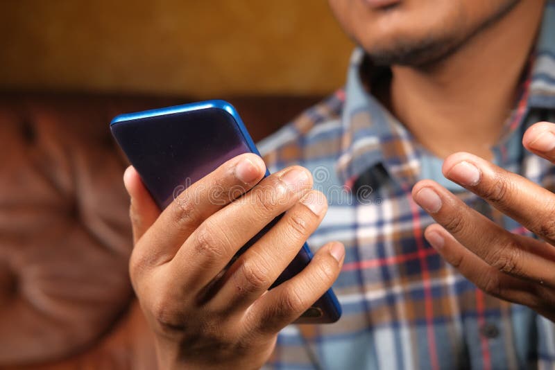 Close Up of Young Man Hand Using Smart Phone. Stock Image - Image of ...