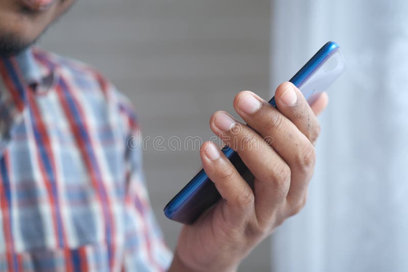 Close Up of Young Man Hand Using Smart Phone. Stock Photo - Image of ...