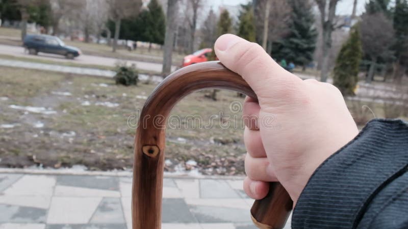 Close Up of Young Hands Holding a Cane Stock Video - Video of closeup ...