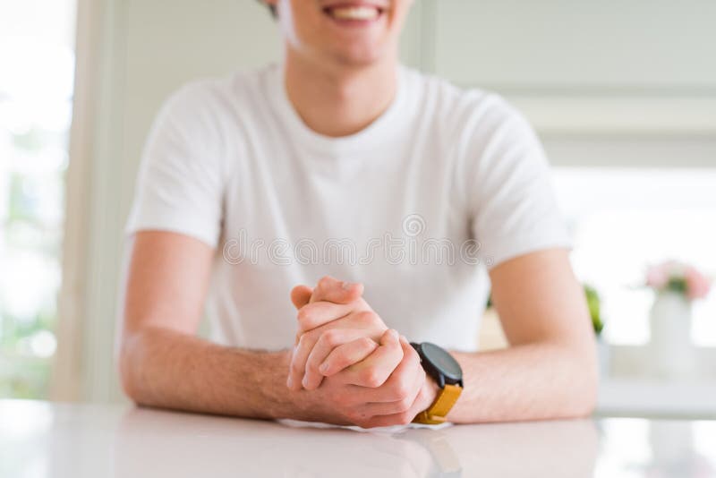 Close Up Young Man Hands Together and Smiling Stock Image - Image of ...