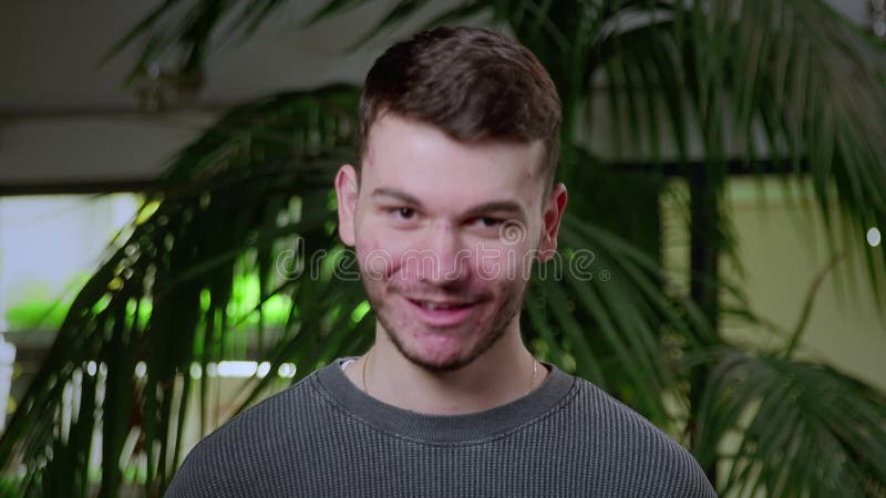 Close-up of a Young Man with Pimples on His Face. the Guy Puts a Mask ...