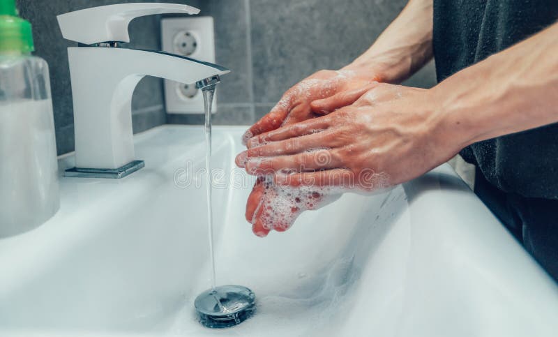 Close Up. Young Man Using an Antiseptic Soap Stock Image - Image of ...