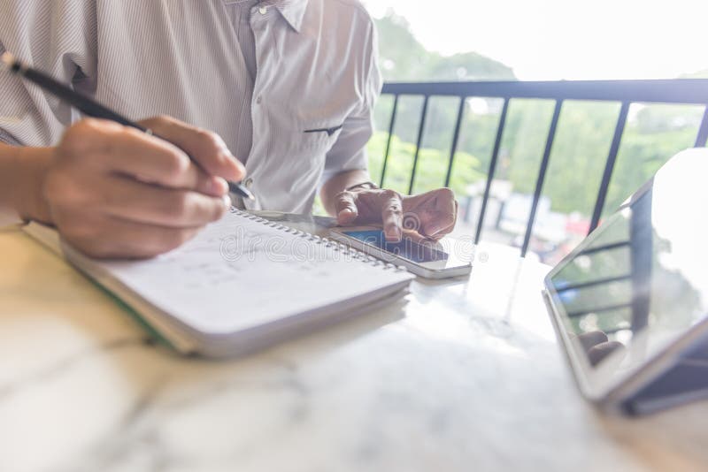 Close Up of Young Man Writing Notes Stock Image - Image of paperwork ...