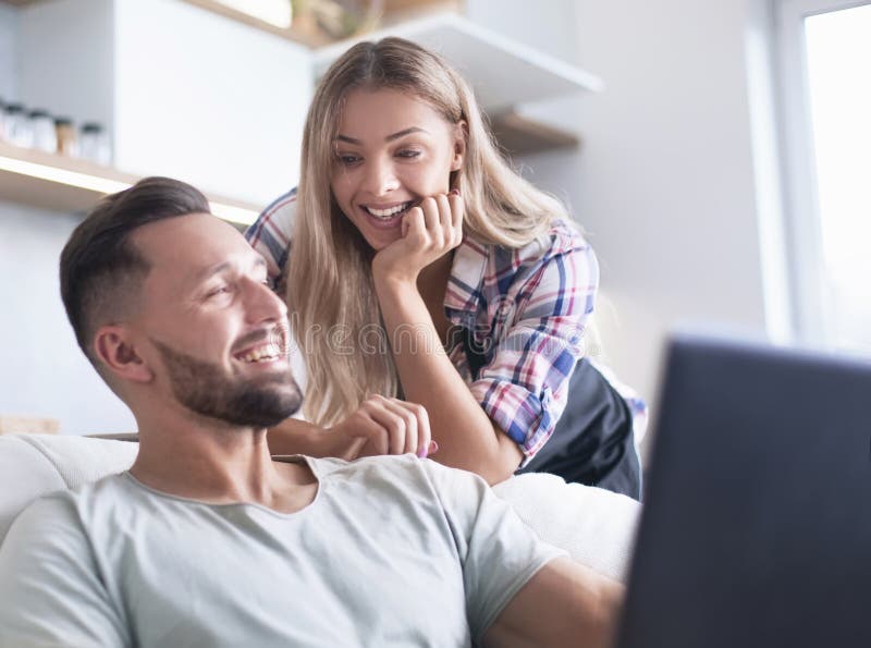 Close Up. Young Couple Looking at Laptop Screen. Stock Photo - Image of ...