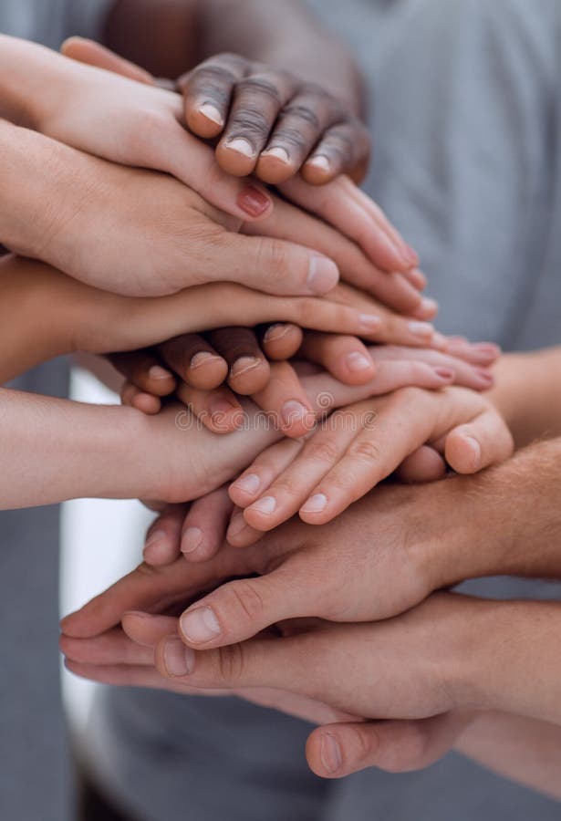 Close Up. Young People Making a Tower of Hands Stock Image - Image of ...