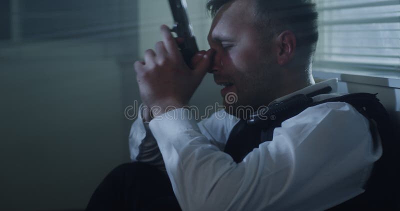 Young Policeman Nervous during Shootout Stock Footage - Video of window ...