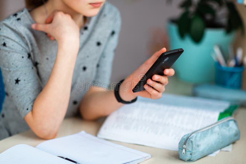 Close Up of Young School Girl Working at Home with Class Notes Checking ...