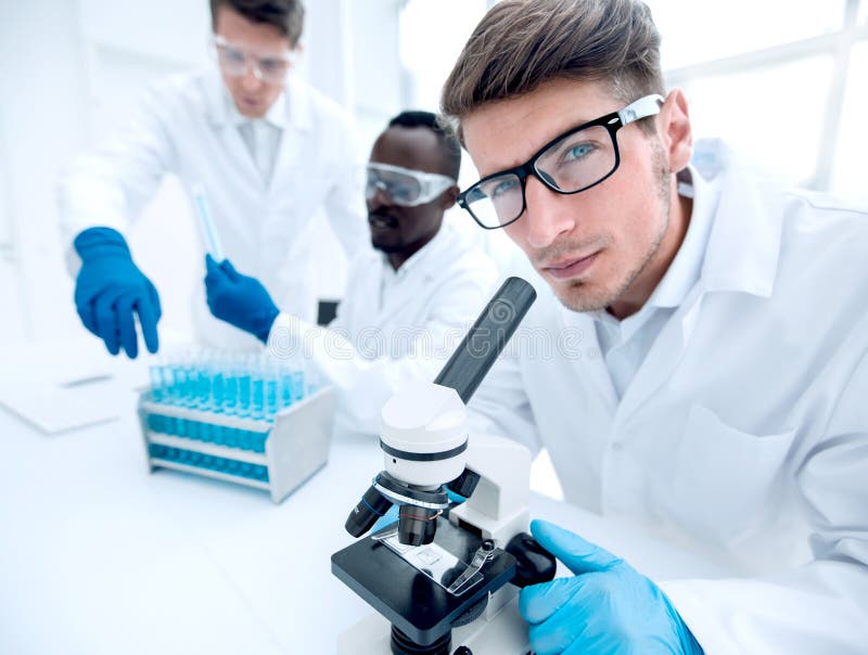 Close Up.a Young Scientist Uses Sitting at a Lab Table Stock Image ...