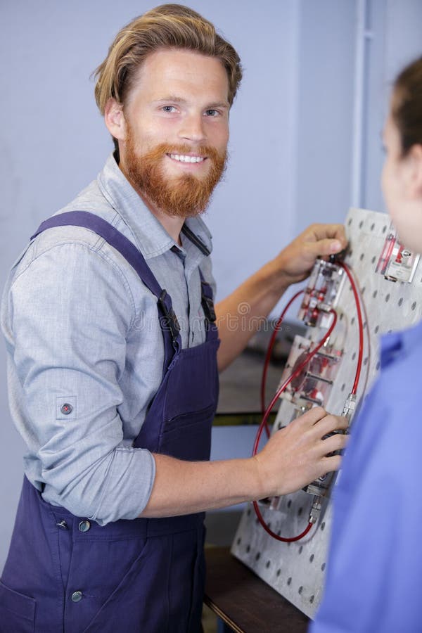 Close-up Young Smiling Man Working with Cables Stock Photo - Image of ...