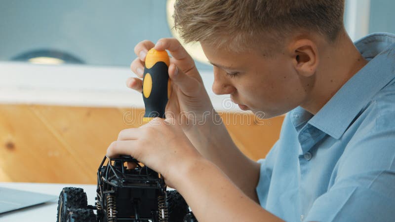 Close Up of Young Student Tighten the Nut by Using Screwdriver ...