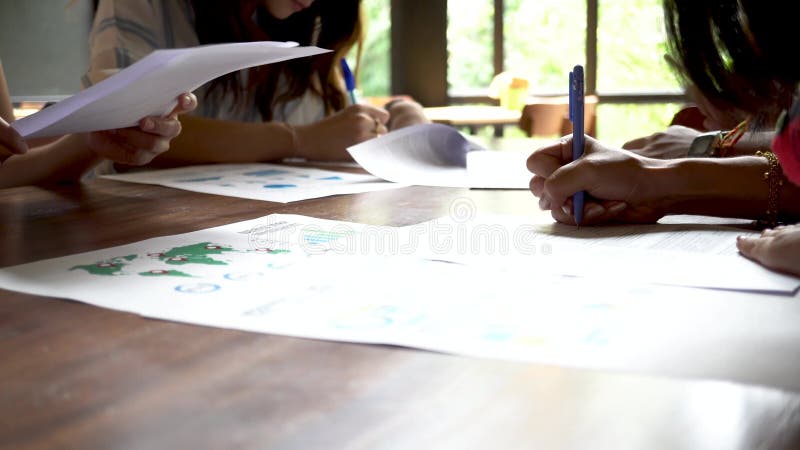 Close Up of Young Students Writing and Preparing Their Presentation ...