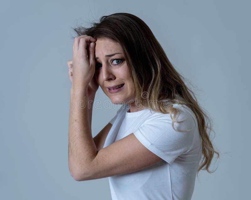Portrait Of A Young Attractive Woman Looking Scared And Shocked Human