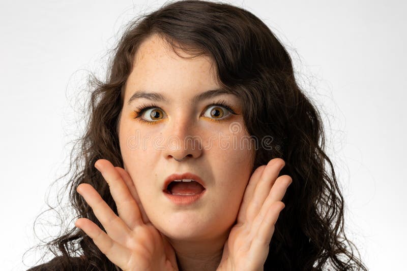 Close-up of Young Woman Looking at Camera, Surprised Stock Image ...