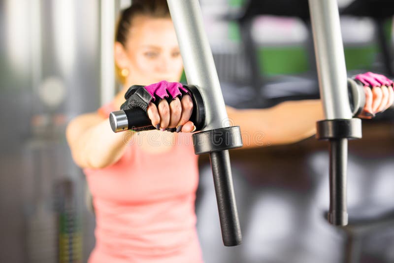 Close-up of Young Woman Making Exercise at the Gym Stock Photo - Image ...