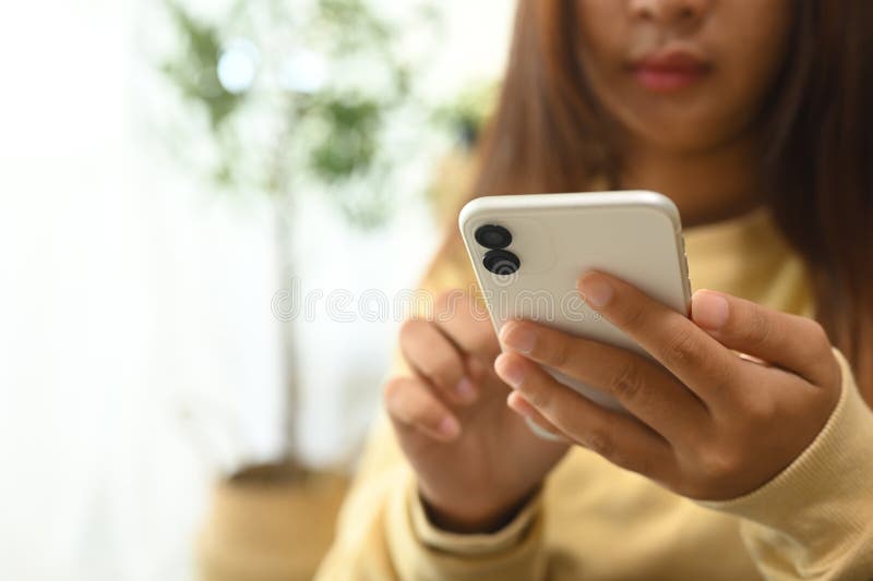 Close Up of Young Woman Reading Text Message, Typing on Her Smartphone ...