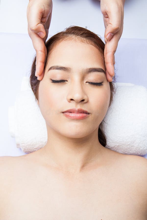 Close Up Of A Young Woman Receiving Back Massage At Spa Stock Image