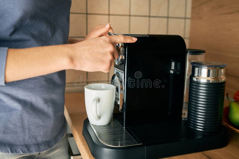 Close-up of a Young Woman& X27;s Hands Making Espresso in an Espresso ...